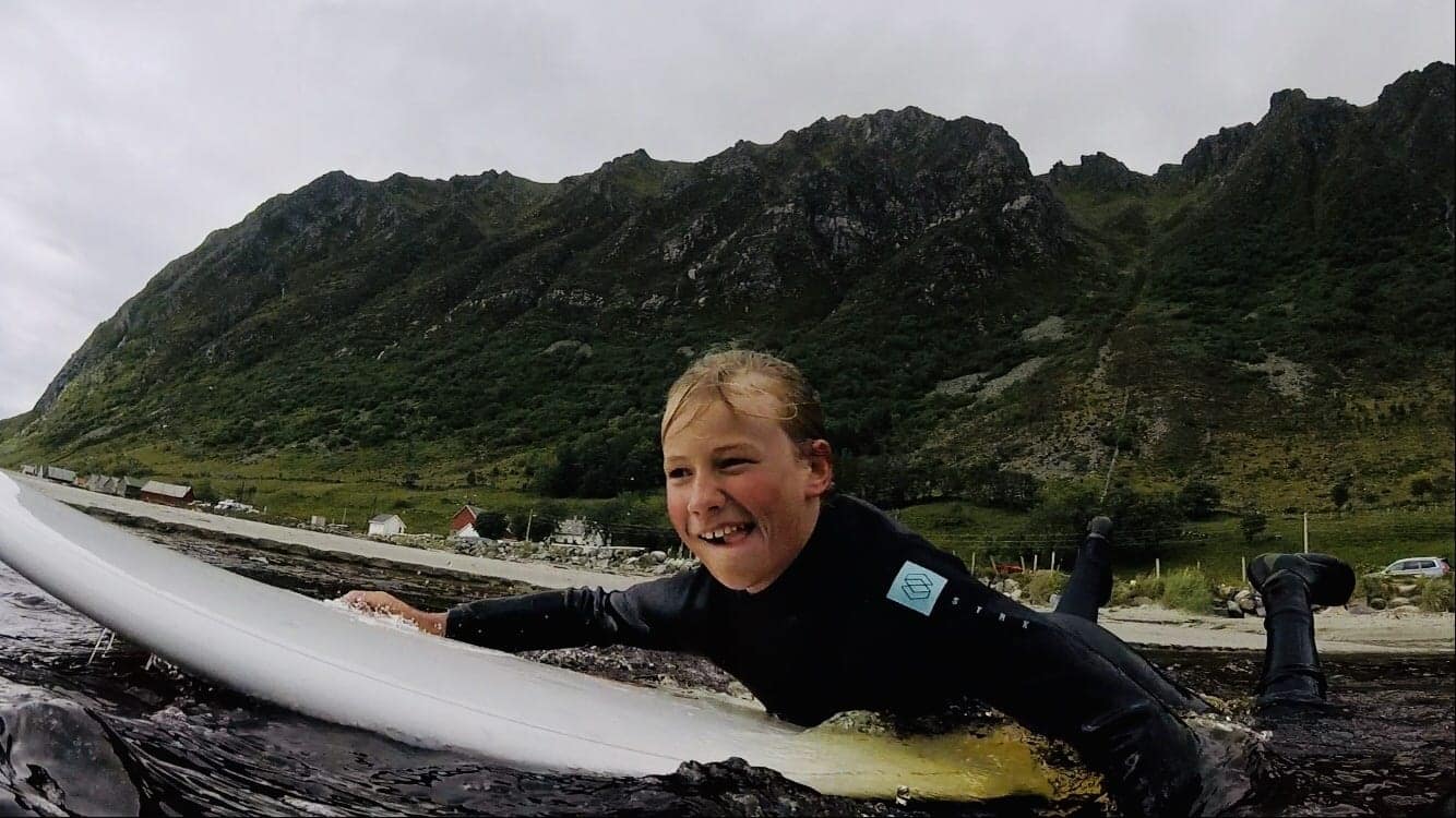 Surfing in West Cape Norway surrounded by Viking like landscape.